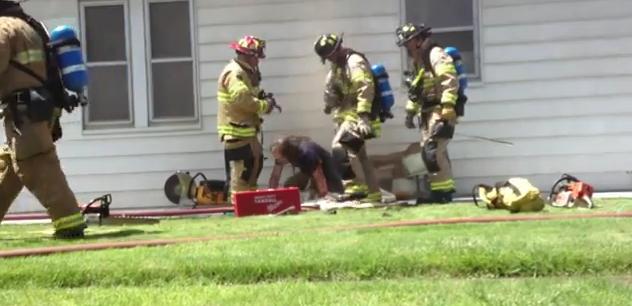 House fire rescue video: Idaho Falls firefighters cut through house to ...
