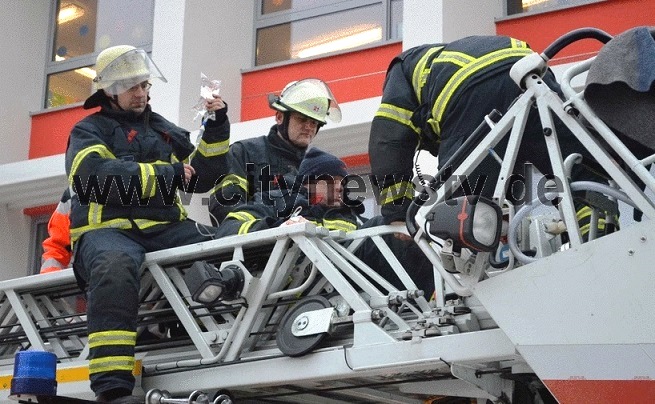 UPDATED: Rescue of firefighter who became trapped in aerial ladder ...