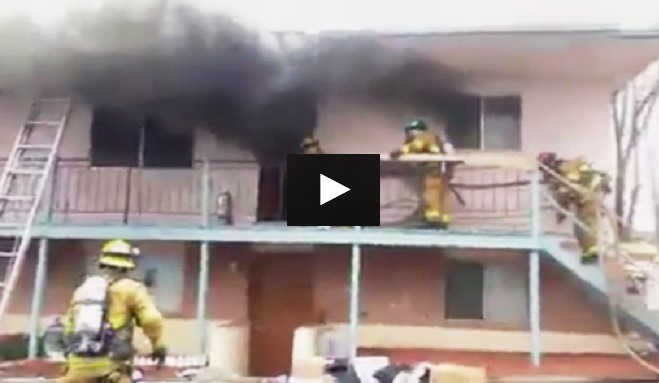Caught on camera: Firefighters rescue woman from burning Colorado ...