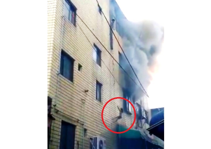 Caught on video: Airman organizes rescue at fire as people jump & kids ...