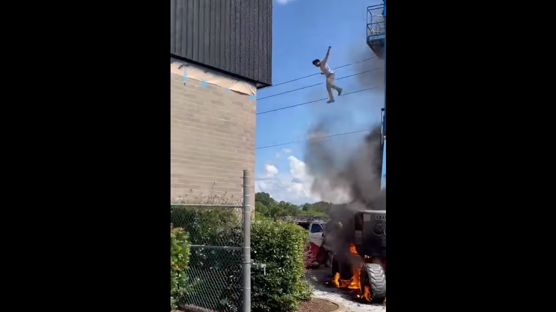 Must see: Man jumps from burning lift into makeshift net set up by ...